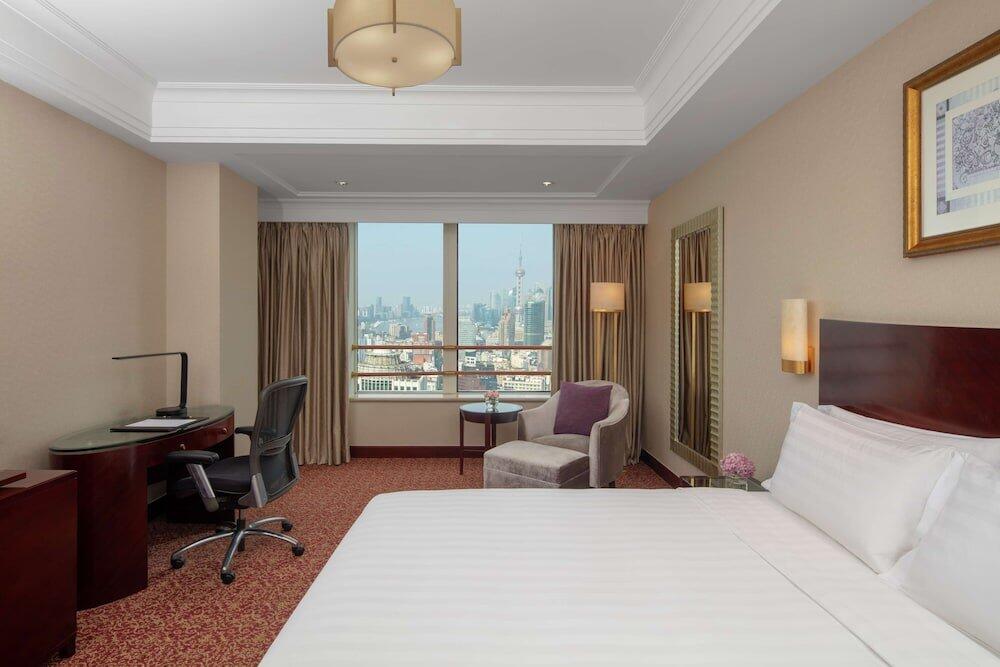Radisson Blu Hotel Shanghai New World, Shanghai - Central de Reservas